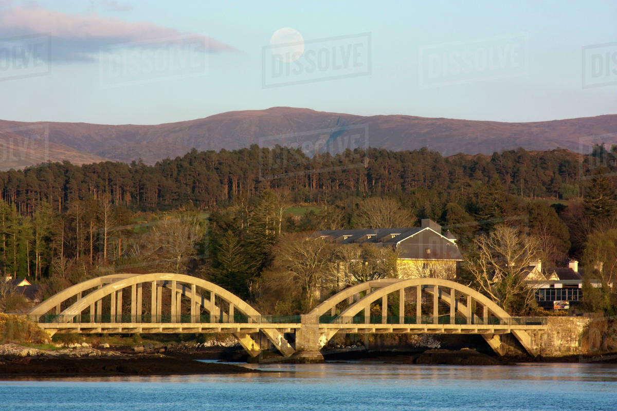 A bridge with two arches crossing roughty river;Kenmare, county kerry ...