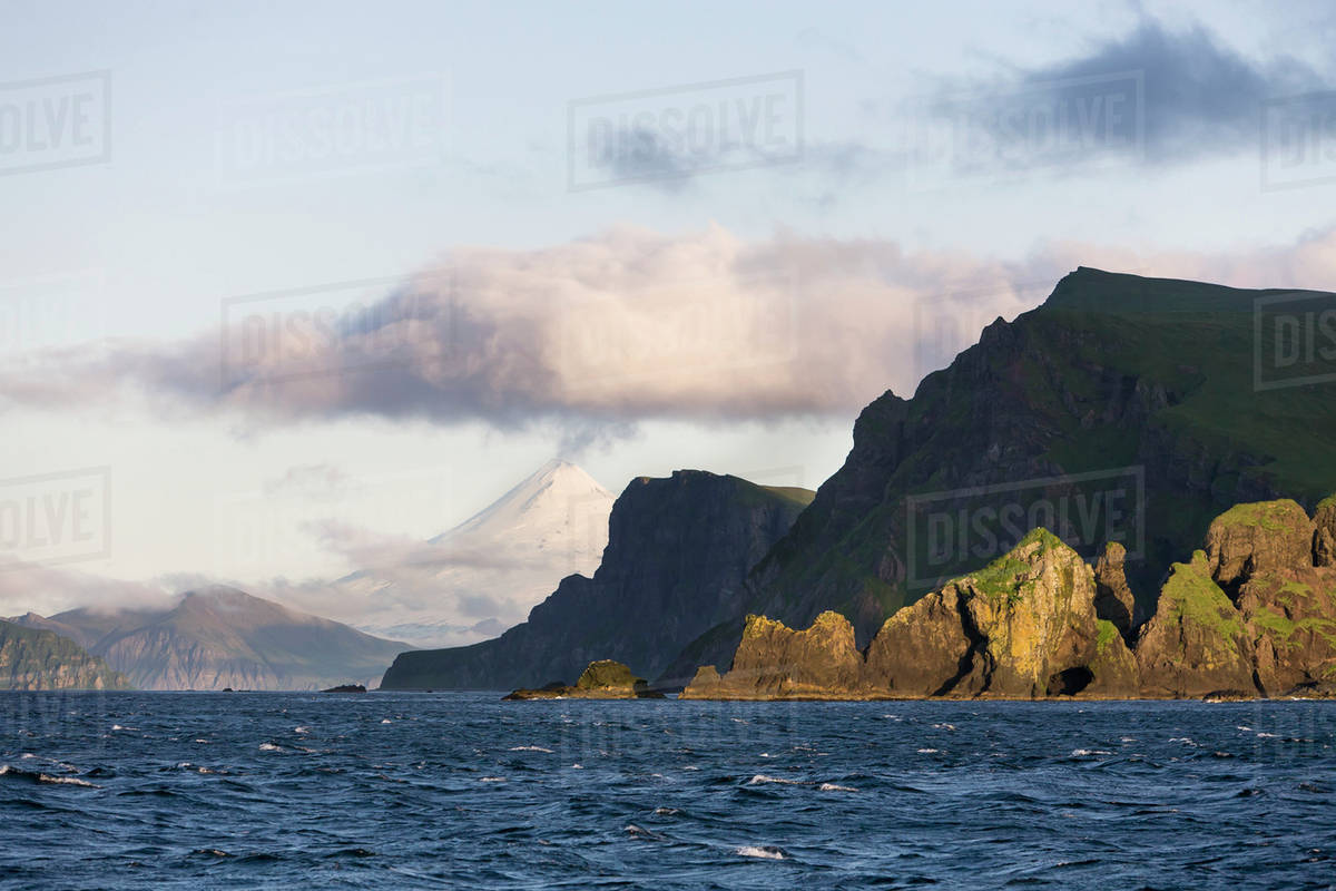 Shishaldin Volcano And Isanotski Peaks In The Background Of The Rugged ...