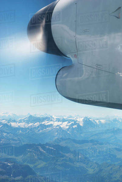 Airplane propeller flying over the swiss alps;Switzerland - Royalty ...