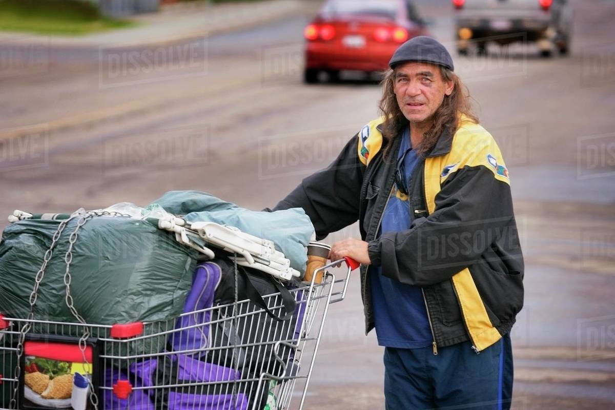 Homeless Man With His Belongings In Shopping Trolley - Royalty-free ...