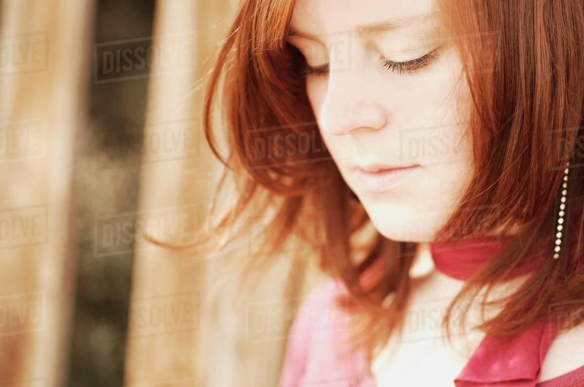 Woman Looking Downwards - Royalty-free Stock Photo | Dissolve