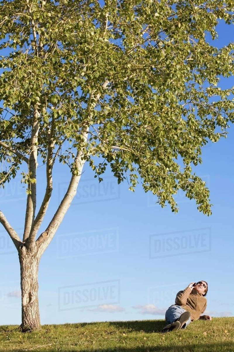Man Resting Under Tree - Royalty-free Stock Photo | Dissolve