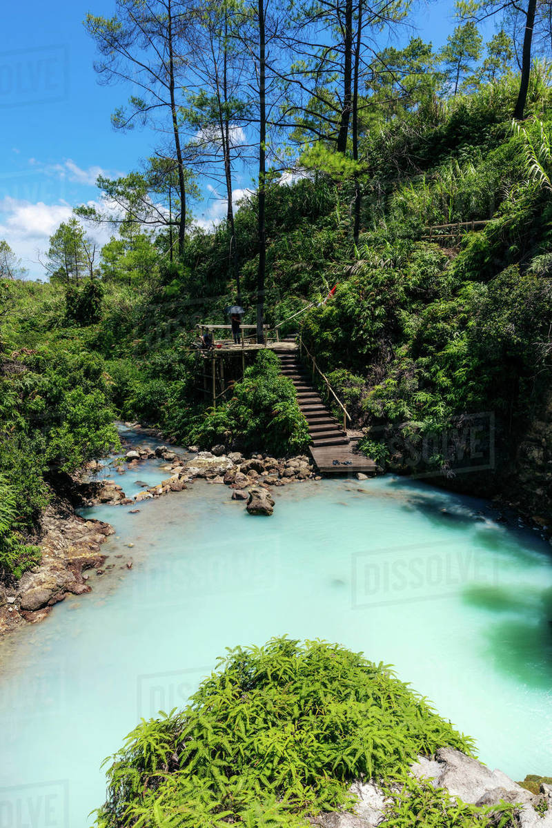 Tourist stands enjoying the lookout platform at Mahwatu wisata Tomohon ...