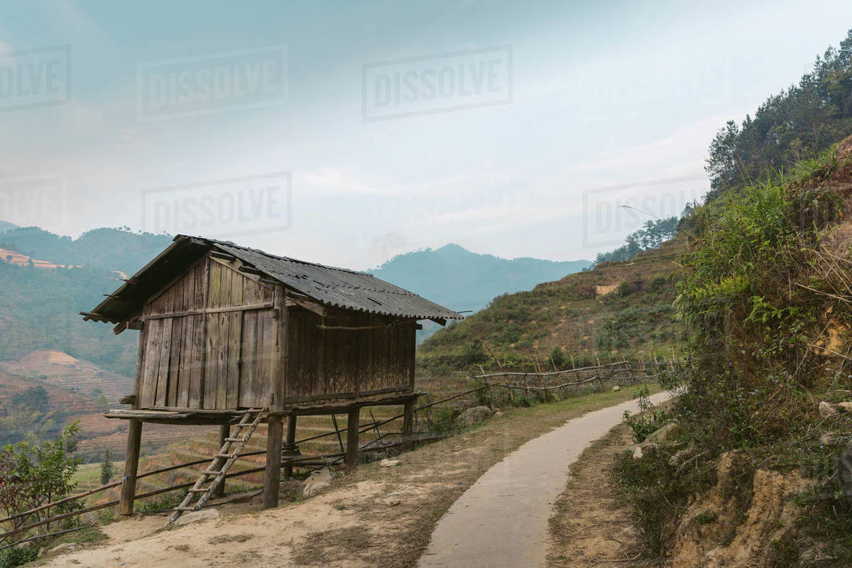 Elevated farm structure along a walking trail in the countryside of Yen ...