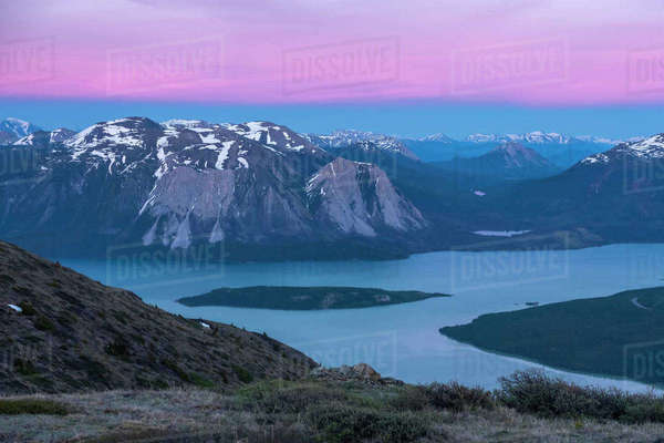 Bove Island can be seen in the centre of Tagish Lake, Yukon. Midnight ...