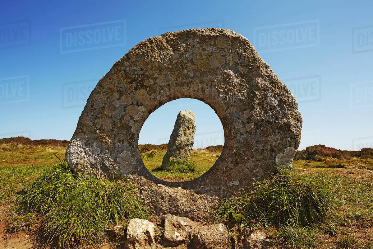 View through the holed stone of the prehistoric Men-an-Tol standing ...