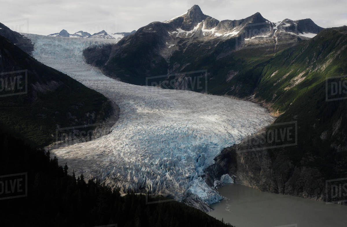 Taku Glacier is a tidewater glacier and the deepest and thickest alpine ...