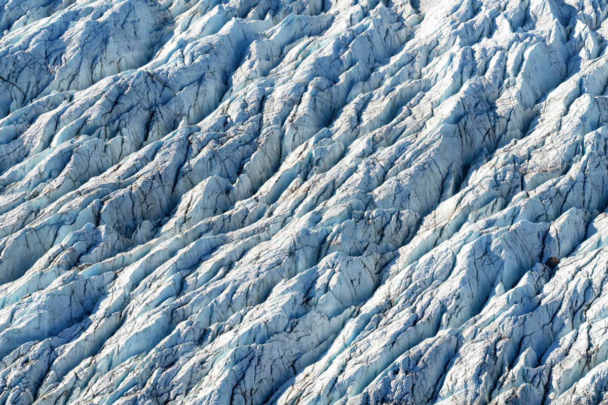 Aerial close-up of a section of the icy patterns of a glacial mass in ...
