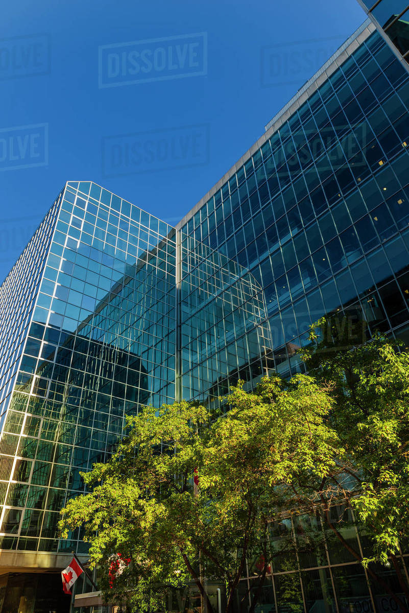 Office buildings with glass facade and reflections, downtown Ottawa ...