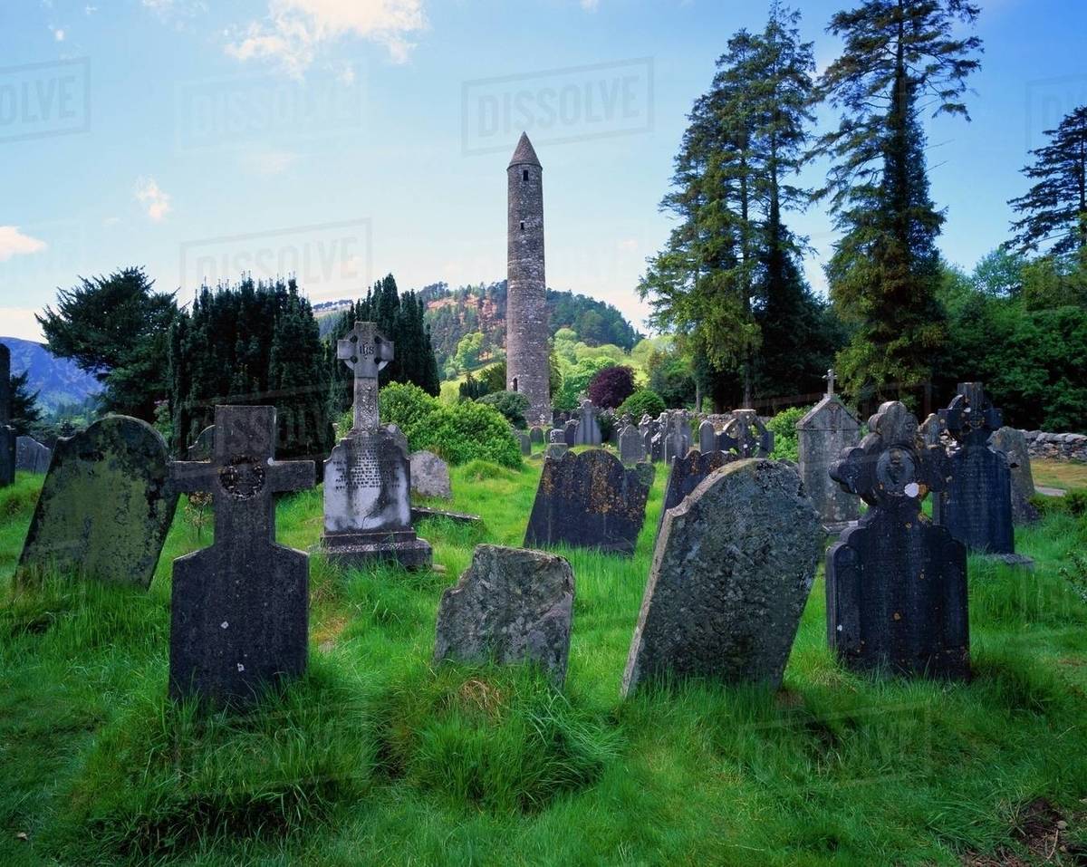 Old Gravestones And Tower Of St. Kevin's Church, Historic Glendalough ...