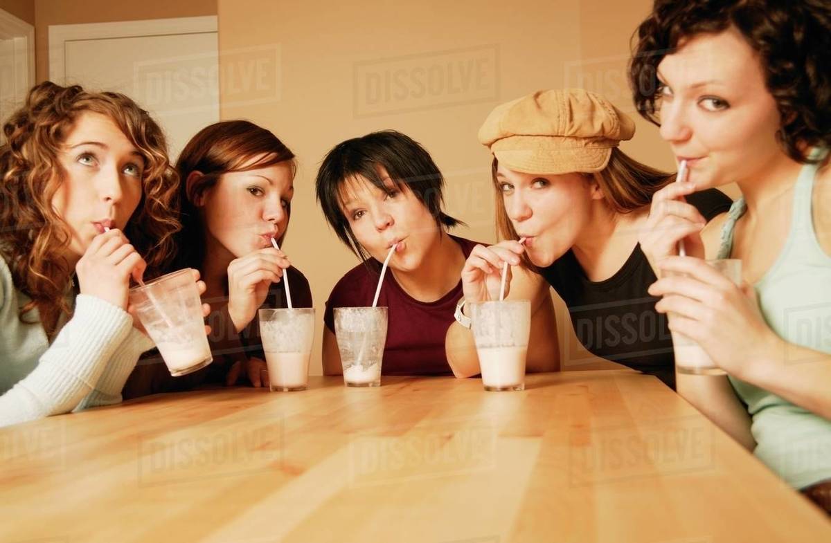 A Group Of Girls Drinking Milkshakes - Royalty-free Stock Photo | Dissolve