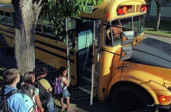 Children Loading A School Bus - Royalty-free Stock Photo | Dissolve