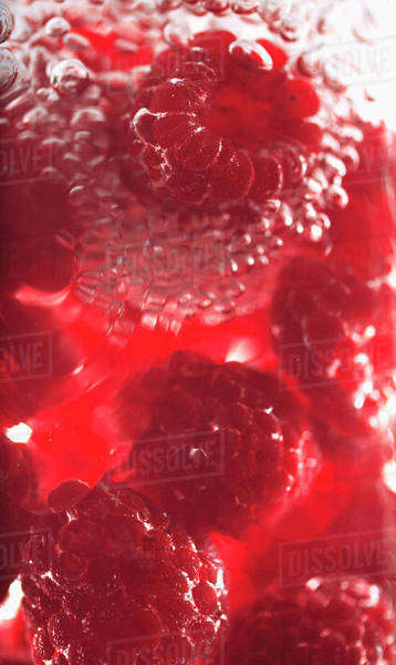 Raspberries Floating In Water - Royalty-free Stock Photo | Dissolve