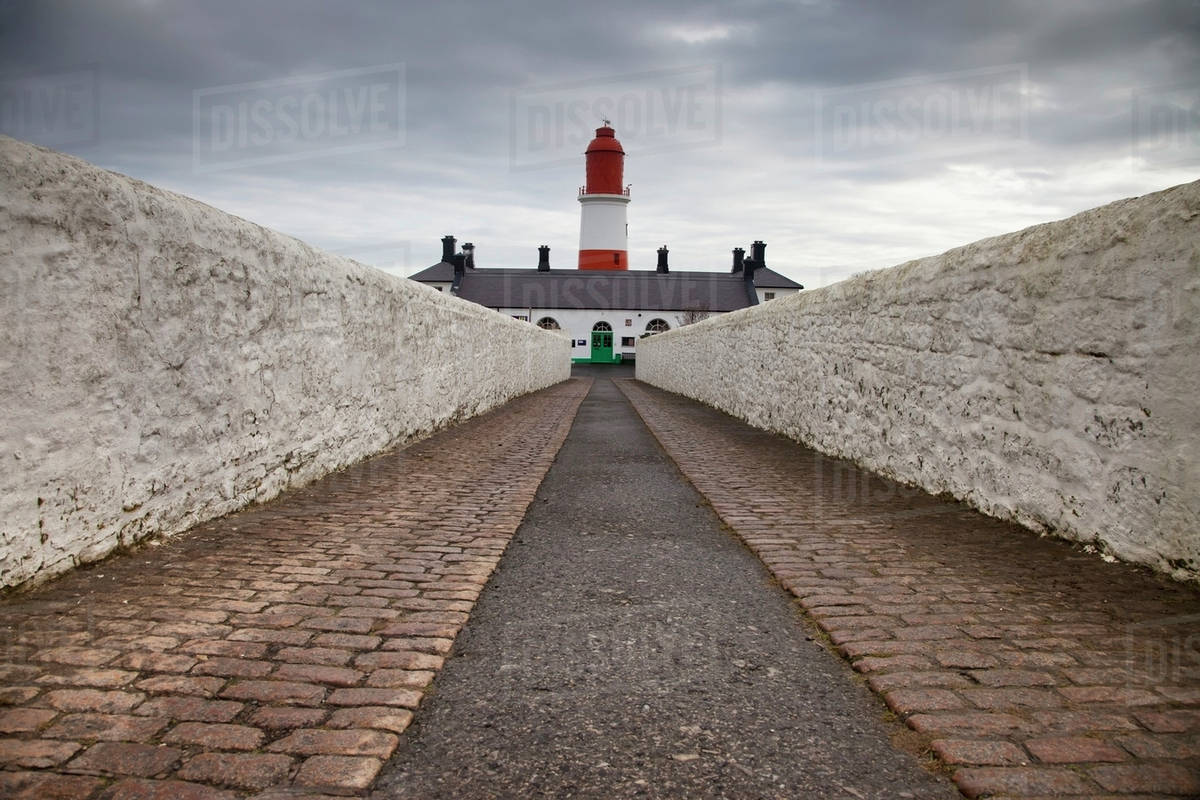 A Path Leading To A Red And White Lighthouse; South Shields, Tyne And ...