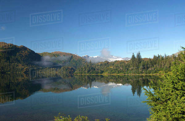 Shrode lake with low lying fog;Prince william sound alaska united ...