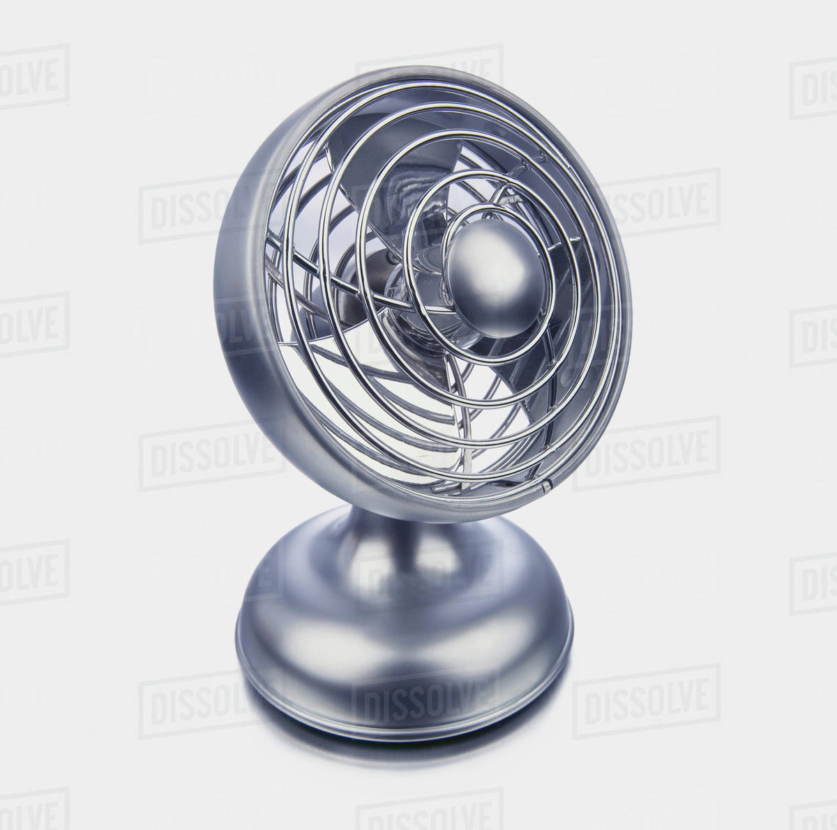 Silver fan on a white background - Stock Photo - Dissolve