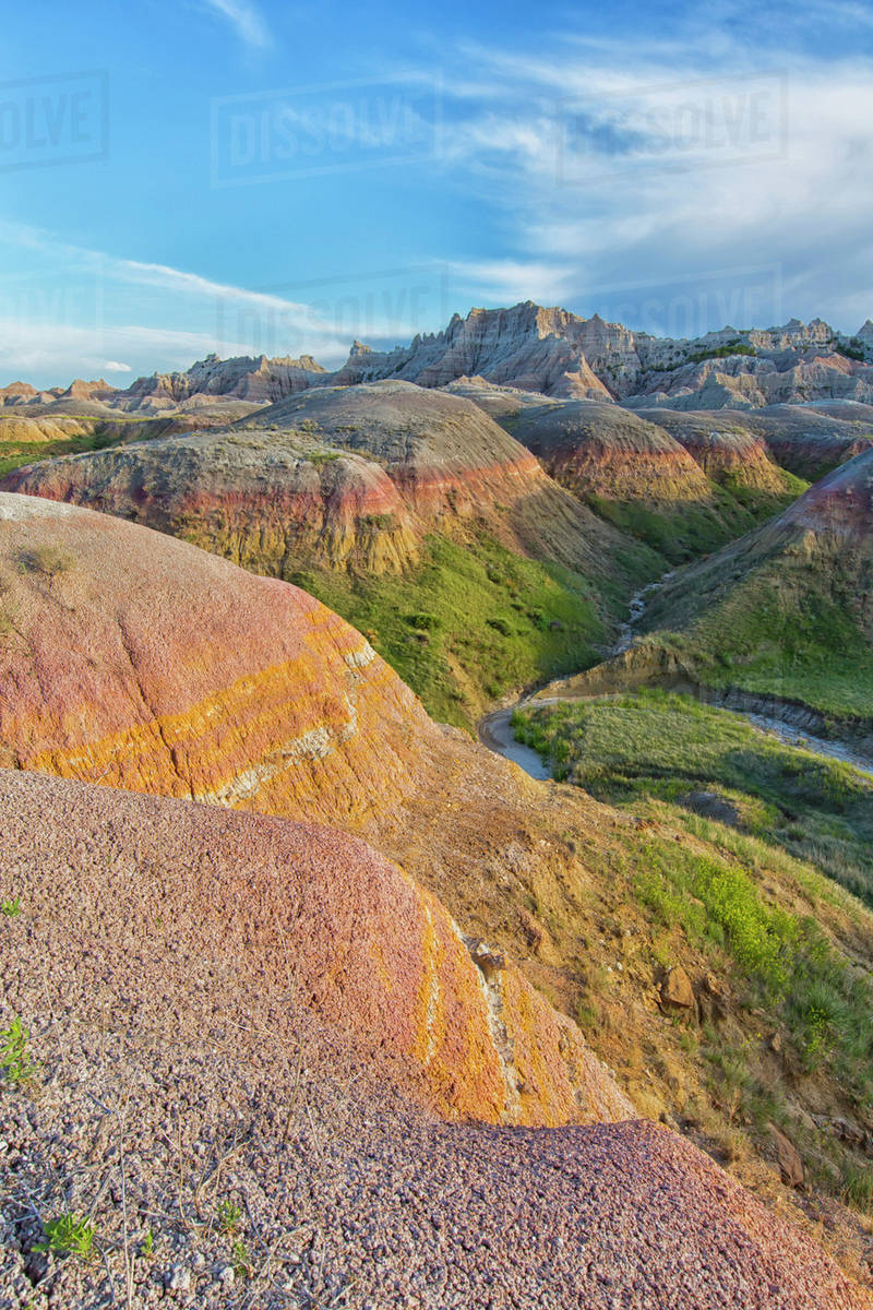 The yellow mounds area at sunset in badlands national park; south ...
