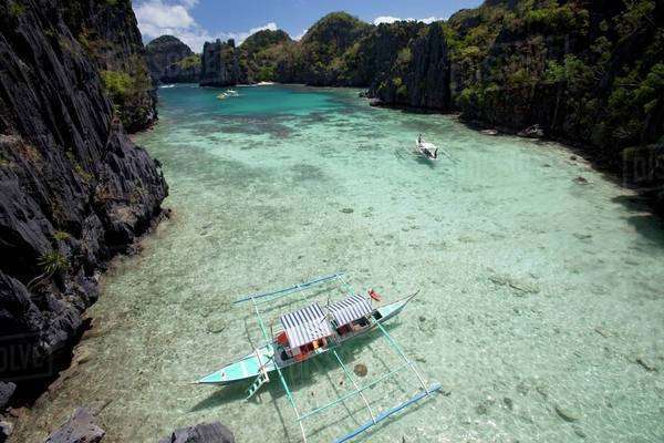 Bangka Boats In The Small Lagoon On Miniloc Island, Near El Nido ...