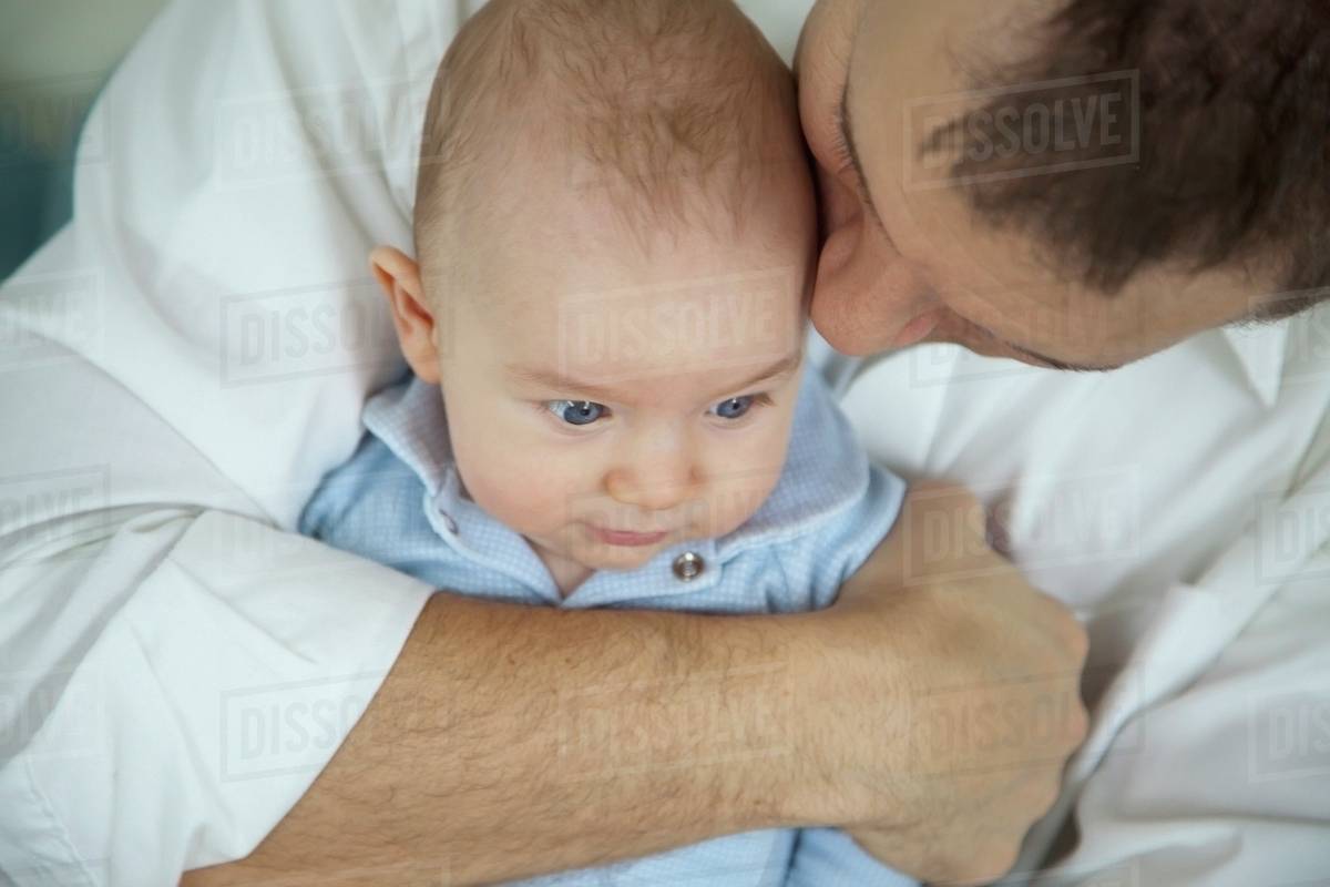 Father Hugging Baby - Royalty-free Stock Photo | Dissolve