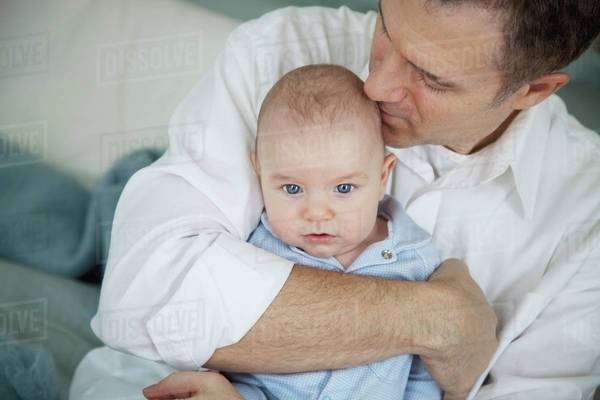 Father Hugging Baby - Royalty-free Stock Photo | Dissolve