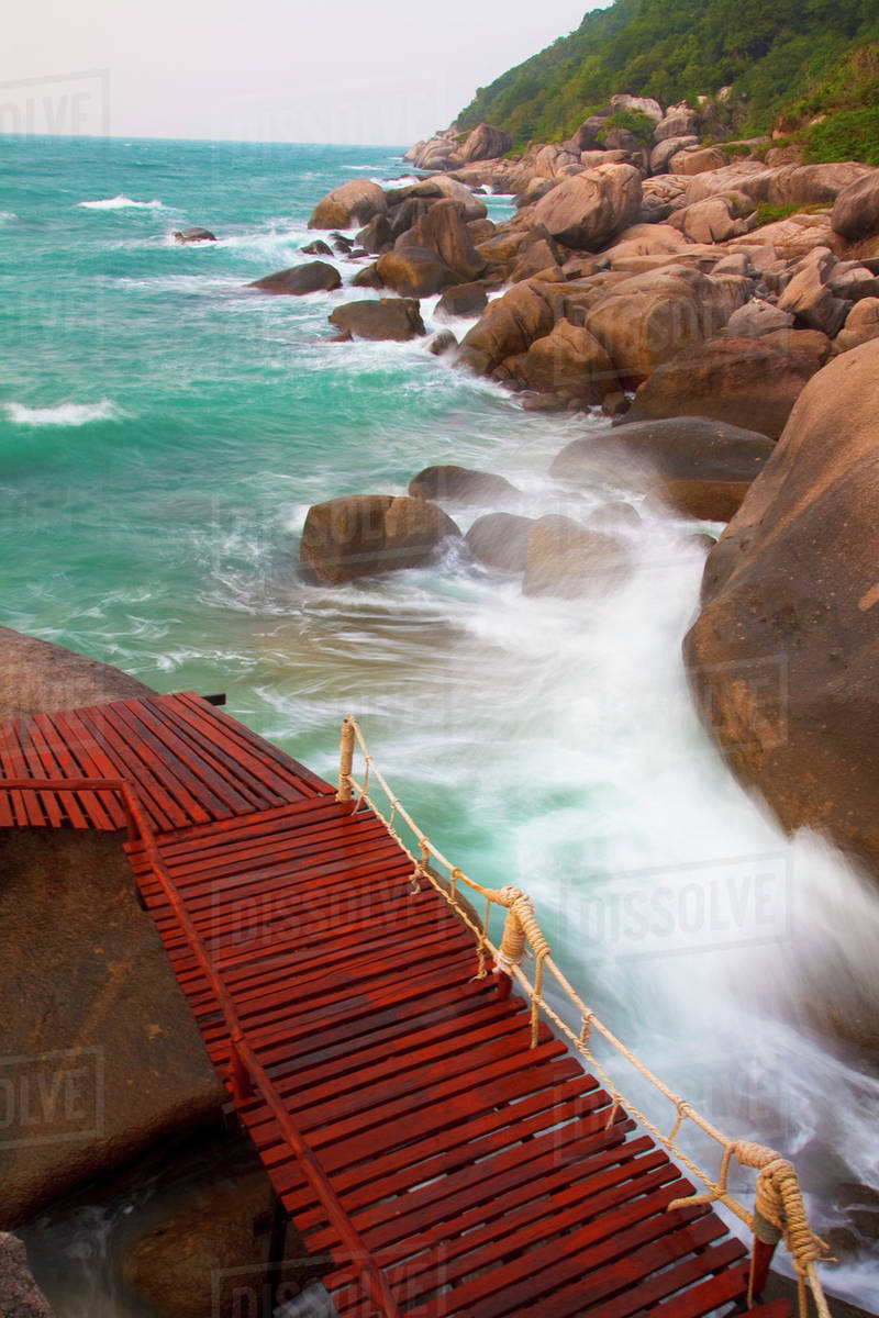 Wooden Boardwalk On The Rocks Along The Ocean; Koh Tao Thailand ...
