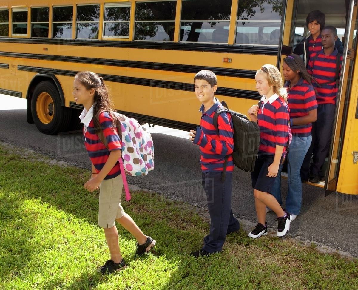 Students Getting Off The School Bus - Royalty-free Stock Photo | Dissolve
