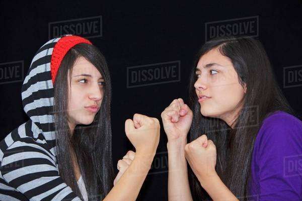 Teenage Girls Holding Up Their Fists To Fight - Royalty-free Stock ...