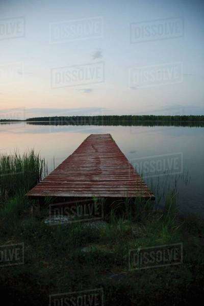 Saskatchewan, Canada; A Dock Going Out To Anglin Lake - Royalty-free ...