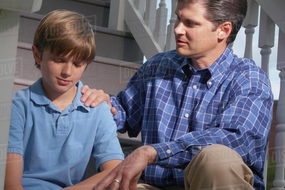 A Father Praying With His Son - Royalty-free Stock Photo | Dissolve