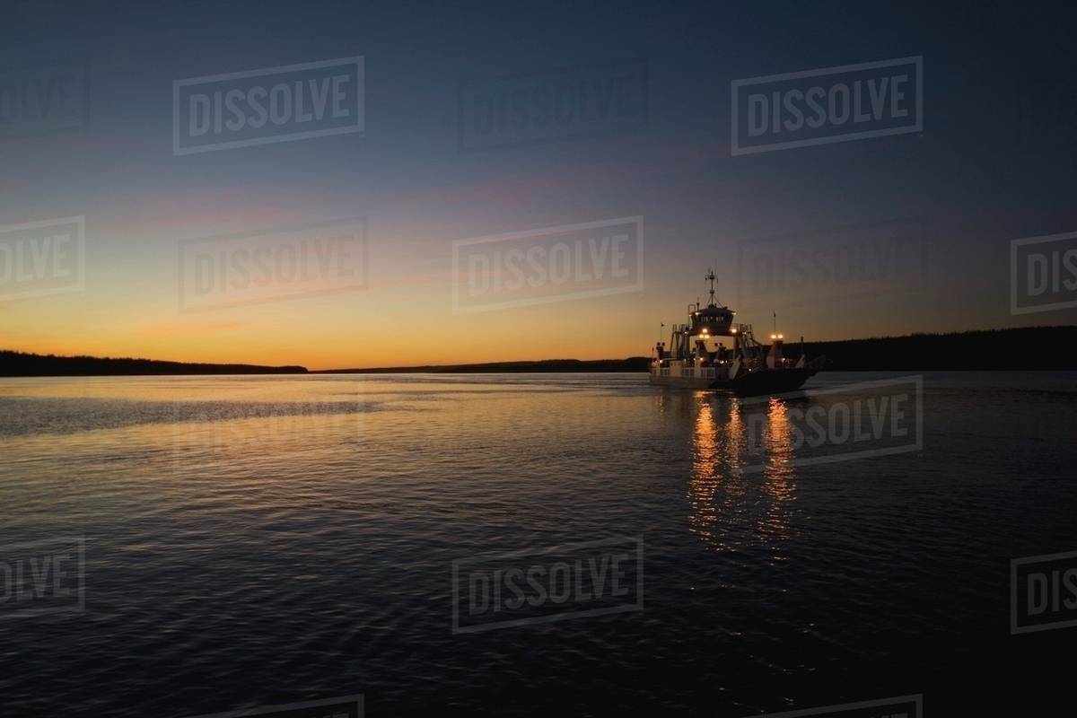 Northwest Territories, Canada; Ferry Crossing The Mackenzie River ...