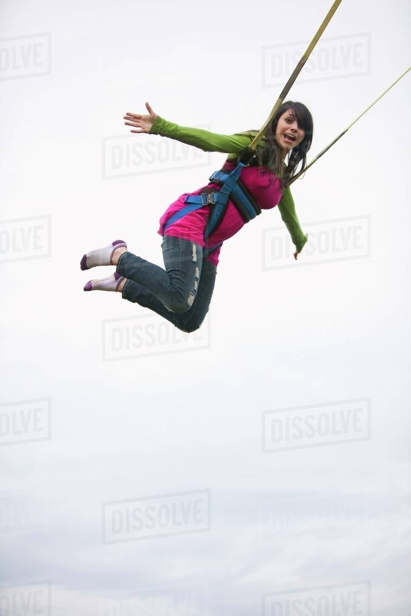 A Girl Hanging From A Harness In The Air - Royalty-free Stock Photo ...
