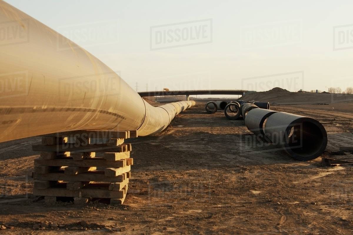 Pipes Laying On The Ground In A Construction Site; Edmonton, Alberta ...