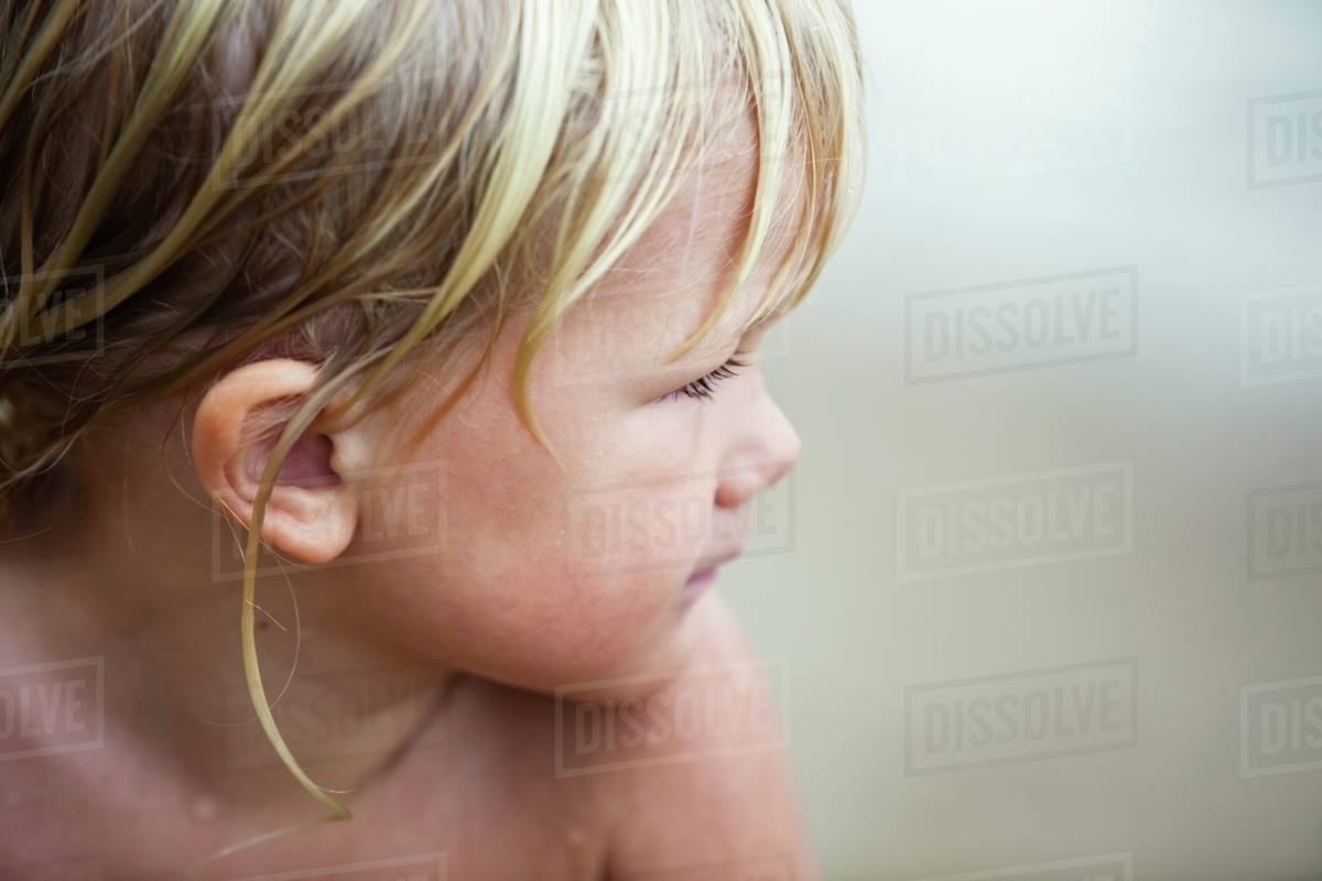 Portrait Of A Child With Wet Hair And Bare Shoulders; Currumbin, Gold ...
