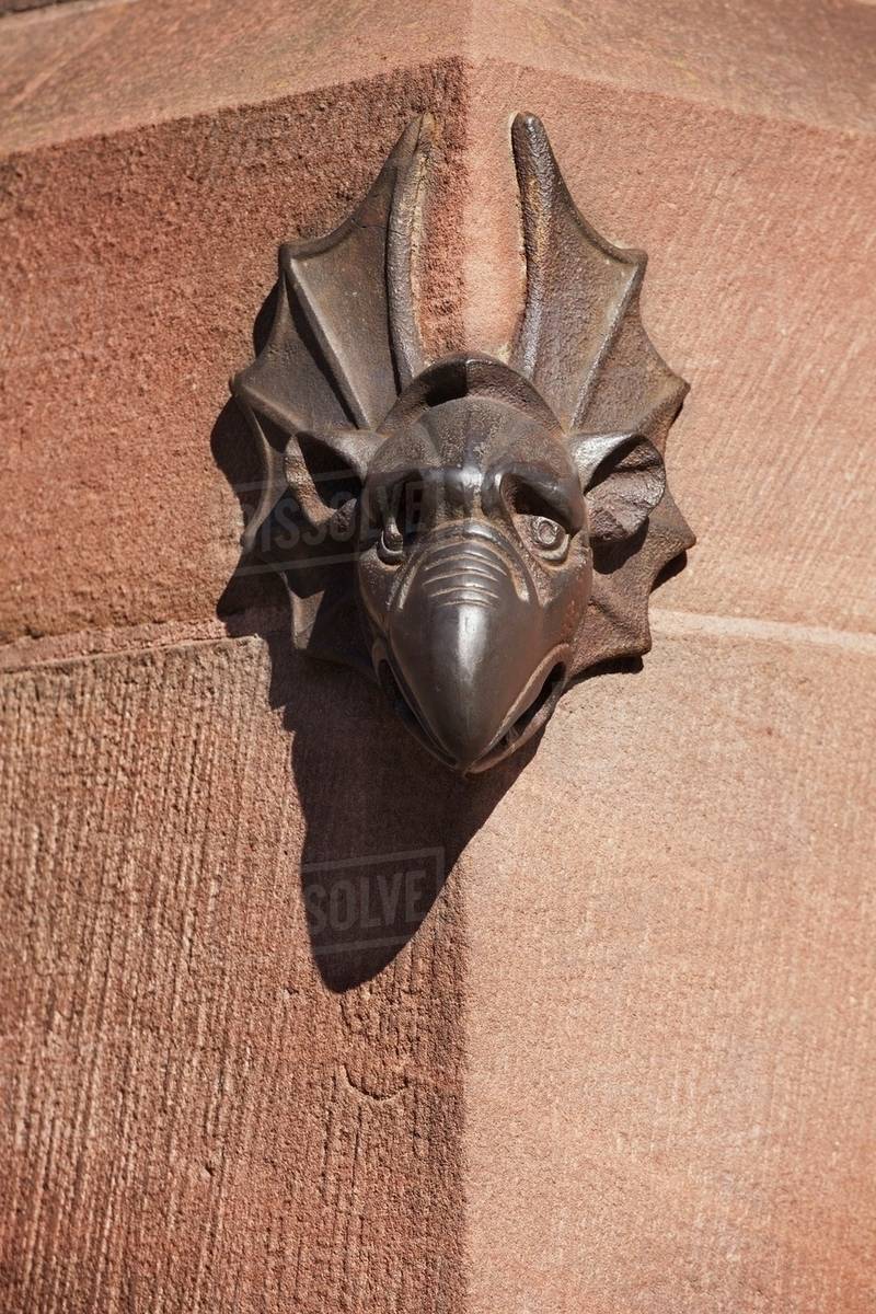 A Sandstone Beaked Gargoyle Face On A Building's Corner; Strasbourg ...