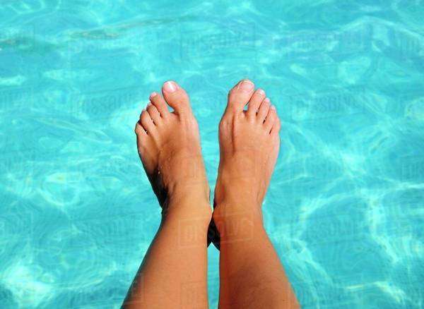 Feet By The Water - Royalty-free Stock Photo | Dissolve