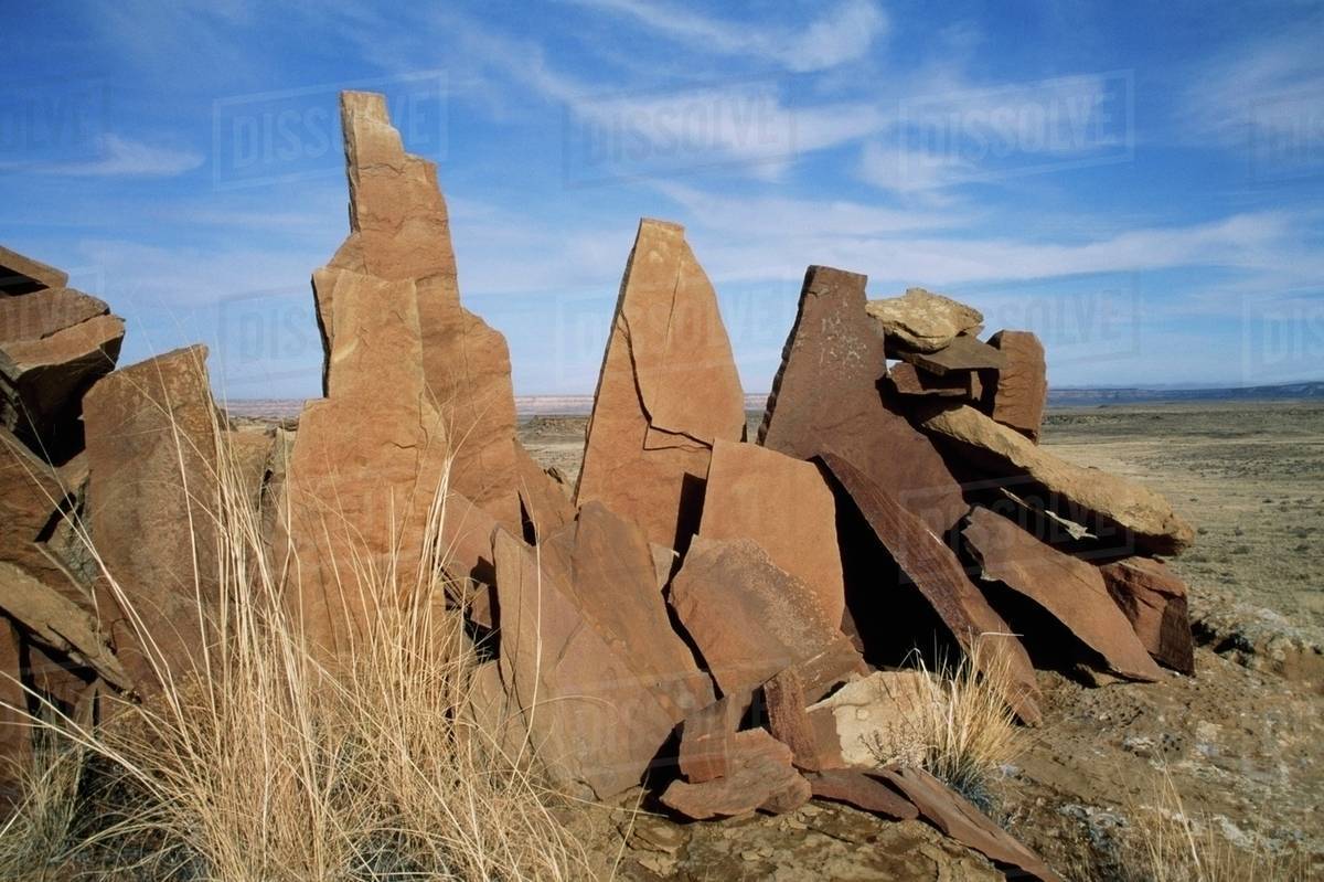 Fence Made From Flat Stone Slabs, New Mexico, Usa - Stock Photo - Dissolve