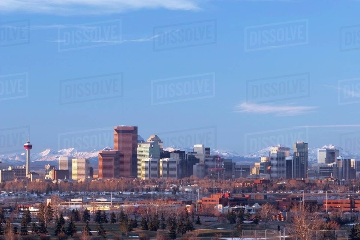 City Skyline With Mountain Backdrop, Calgary, Alberta, Canada - Stock ...