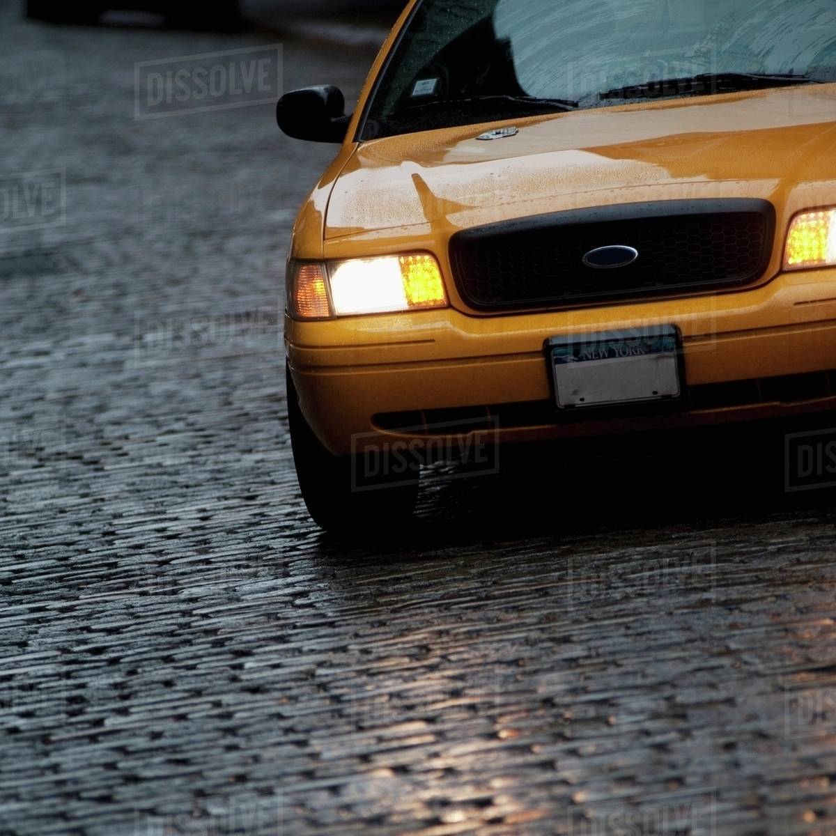 Front Of A Yellow Vehicle - Royalty-free Stock Photo | Dissolve
