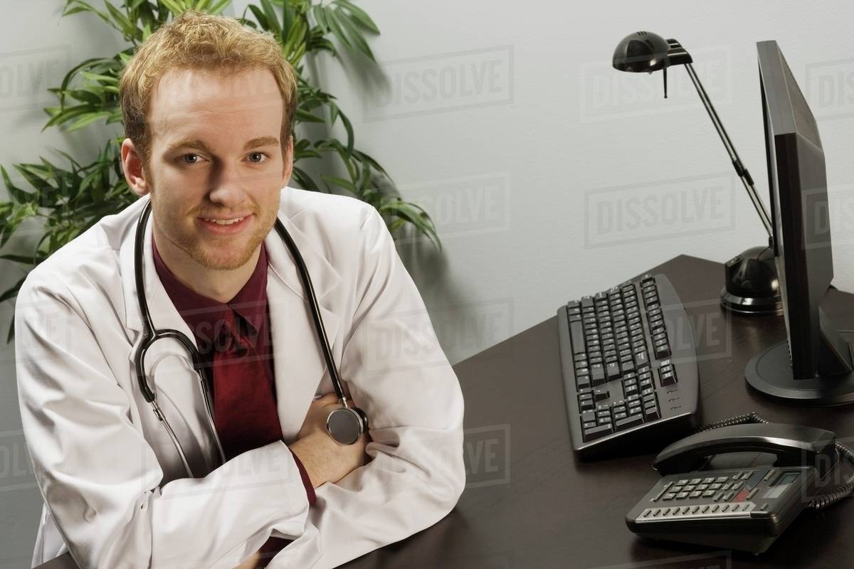 Doctor In His Office - Stock Photo - Dissolve