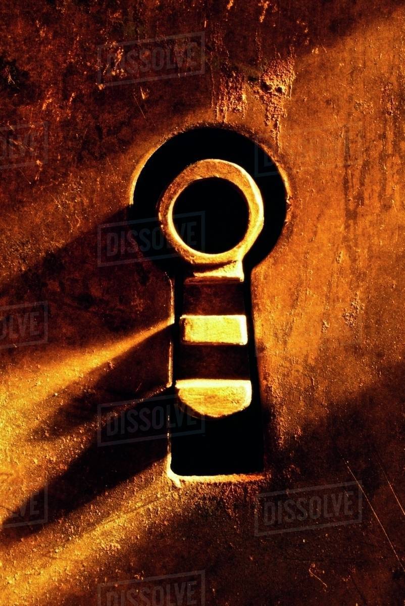 Close-Up Of Skeleton Key Through Keyhole - Royalty-free Stock Photo ...