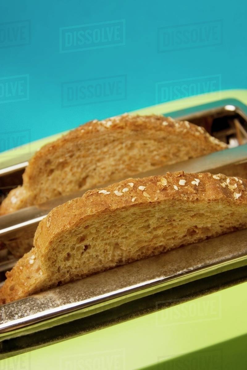 Bread In A Toaster - Royalty-free Stock Photo | Dissolve