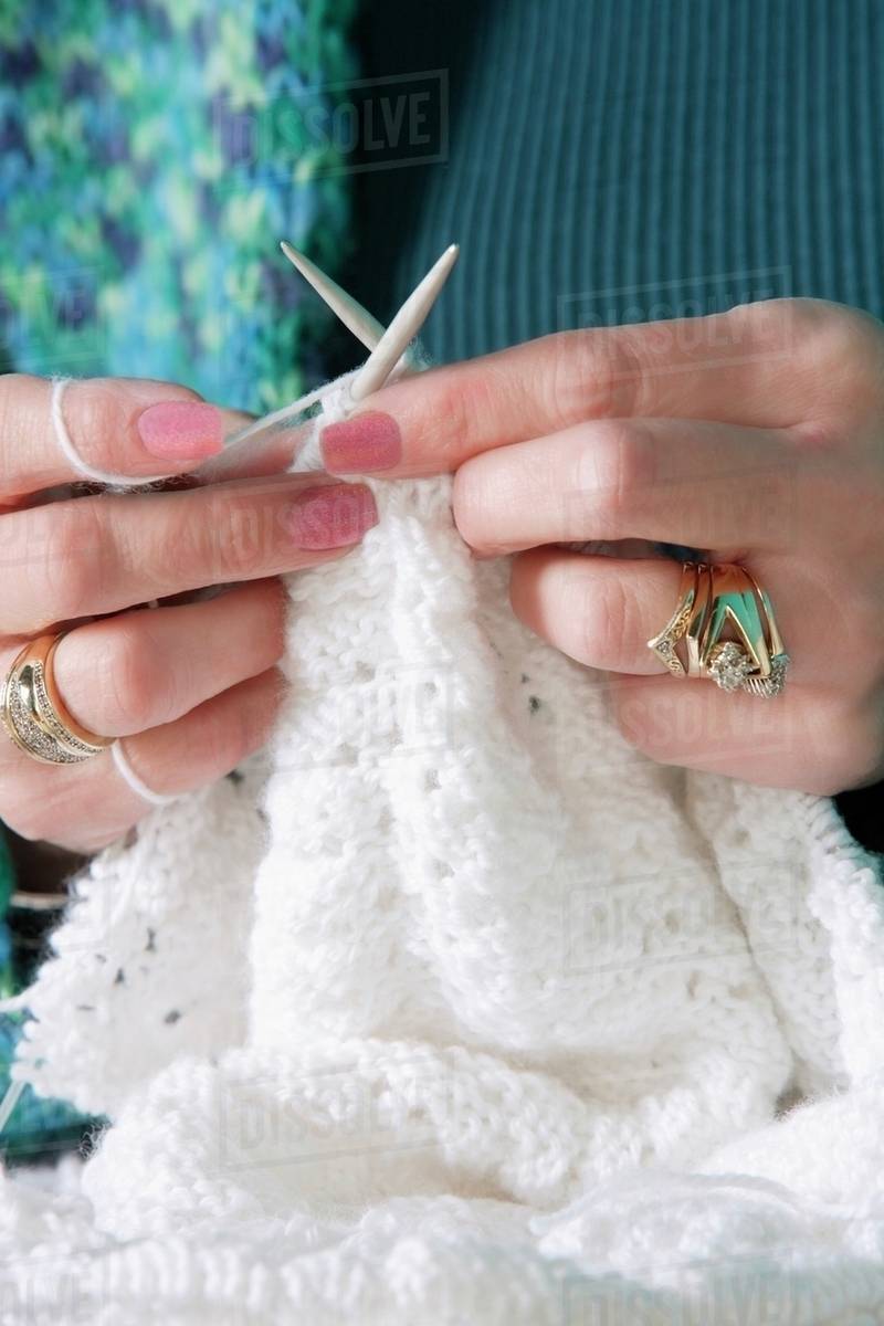 Woman Doing Needle Work - Stock Photo - Dissolve