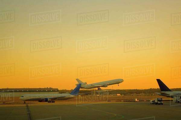 A Commercial Airplane Taking Off - Royalty-free Stock Photo | Dissolve