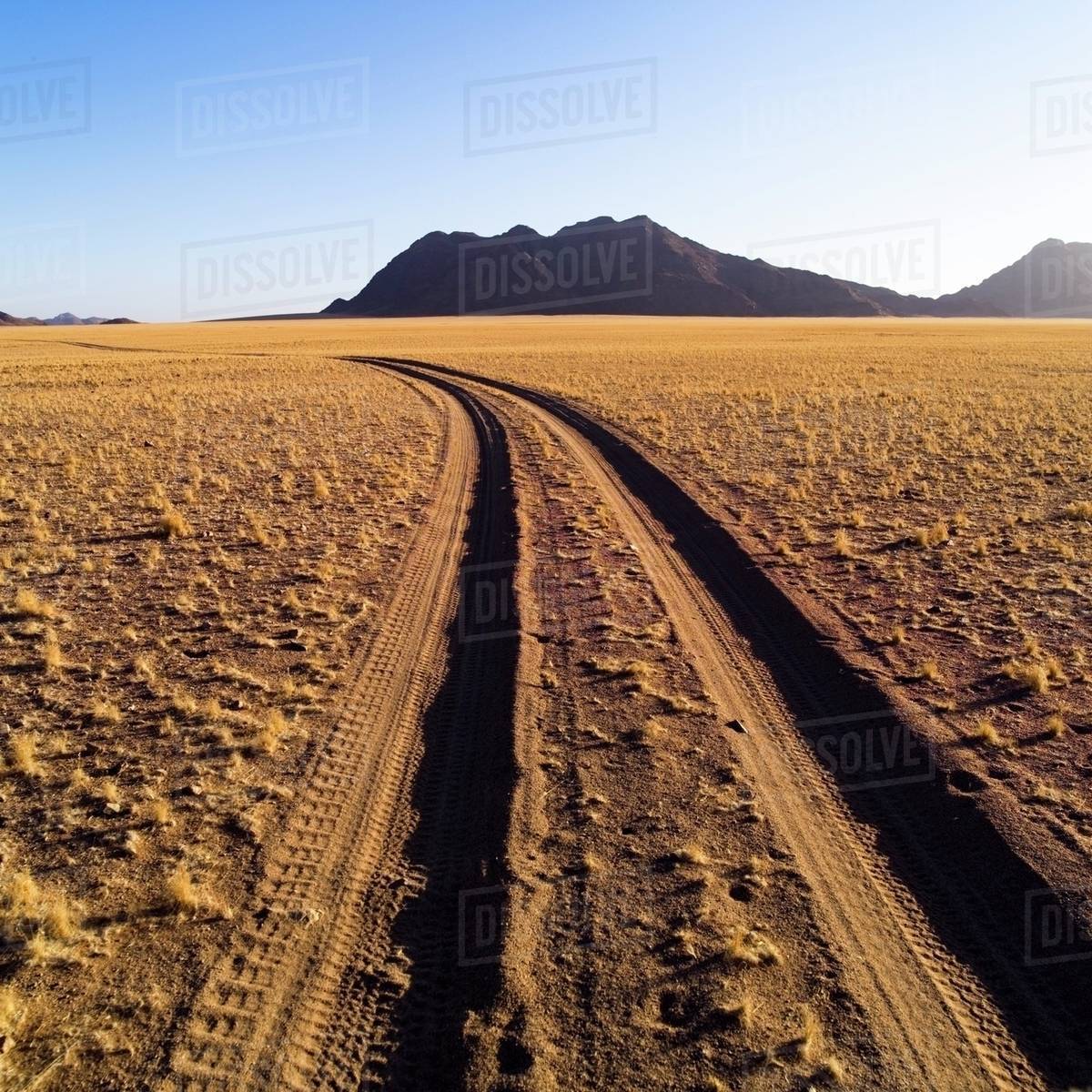 Dirt Road Through The Sand, Namibia, Africa - Stock Photo - Dissolve