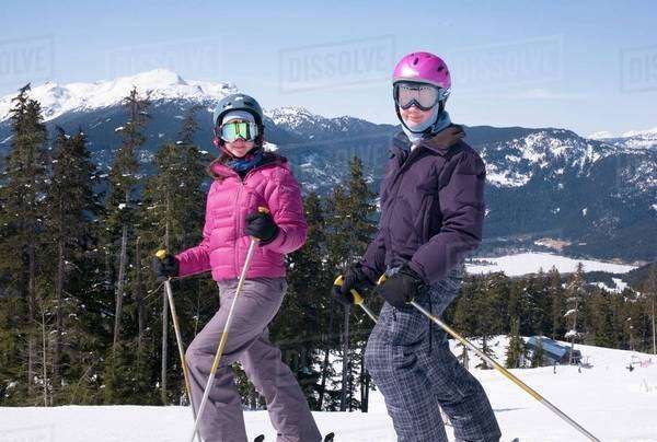 Two Skiers, Whistler, Bc, Canada - Stock Photo - Dissolve