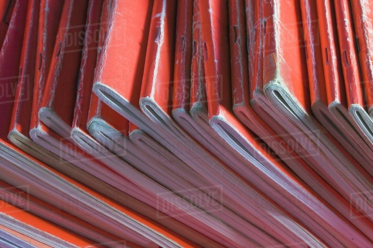 Collection Of Well Used Red Notebooks - Royalty-free Stock Photo | Dissolve