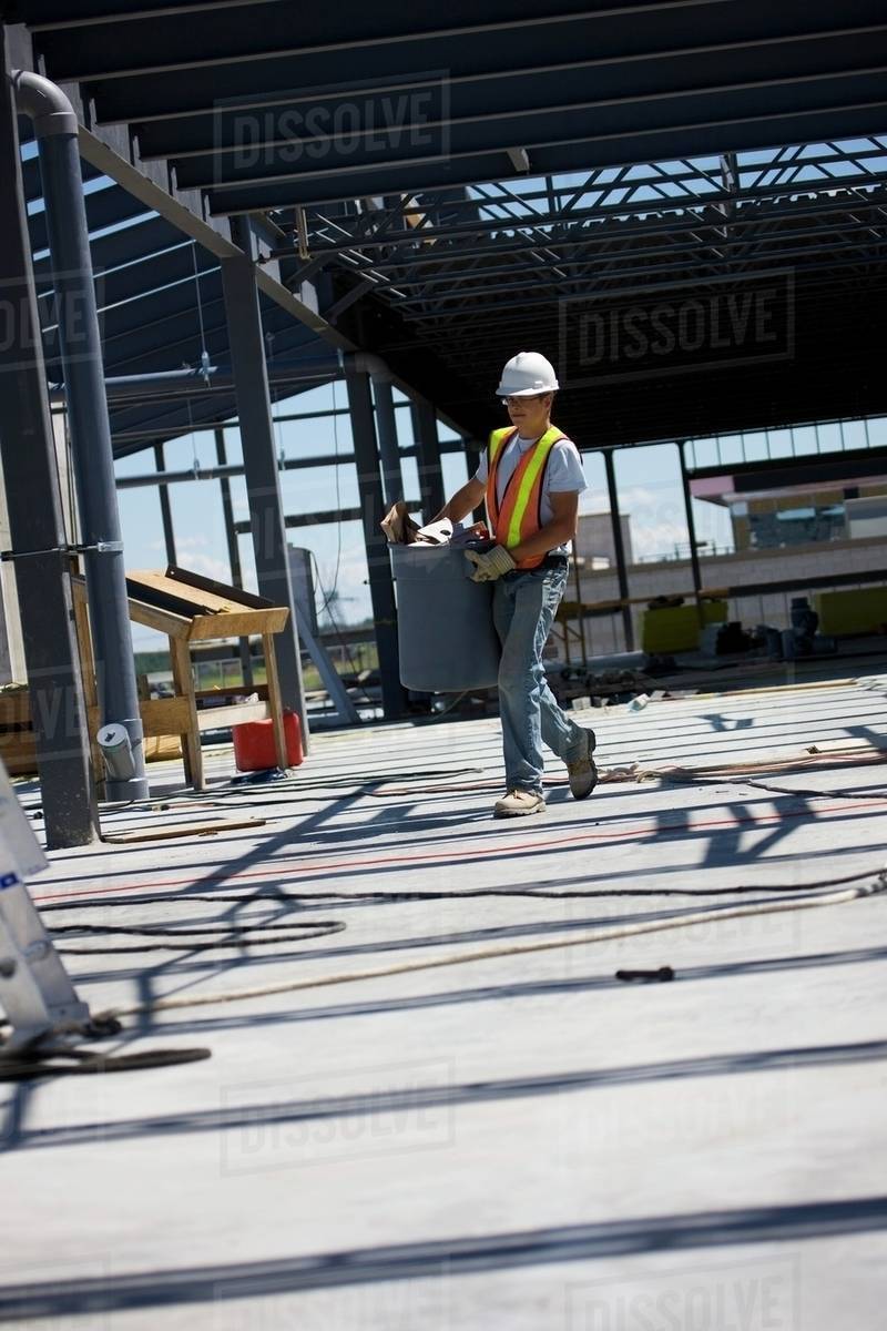 Worker At Construction Site - Stock Photo - Dissolve