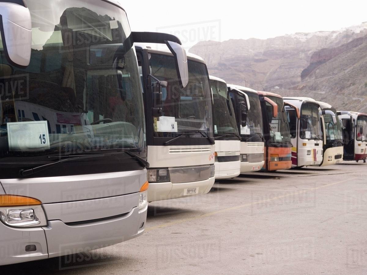 Santorini, Greece; Tour Buses Lined Up - Royalty-free Stock Photo ...