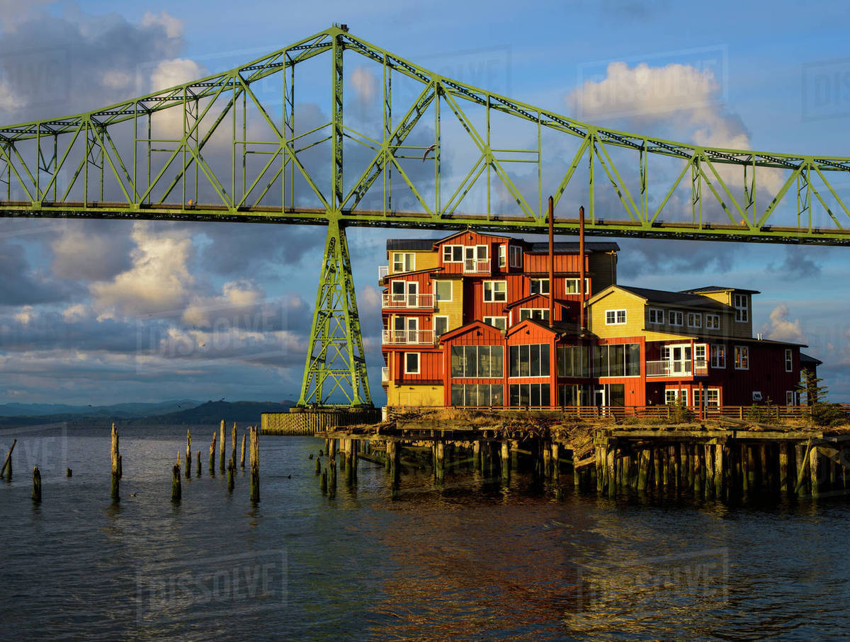 Evening light warms the Astoria-Megler Bridge; Astoria, Oregon, United ...