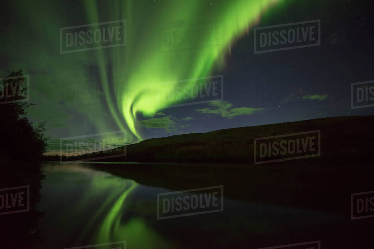 Northern Lights (aurora borealis) over the Pelly River; Ross River ...